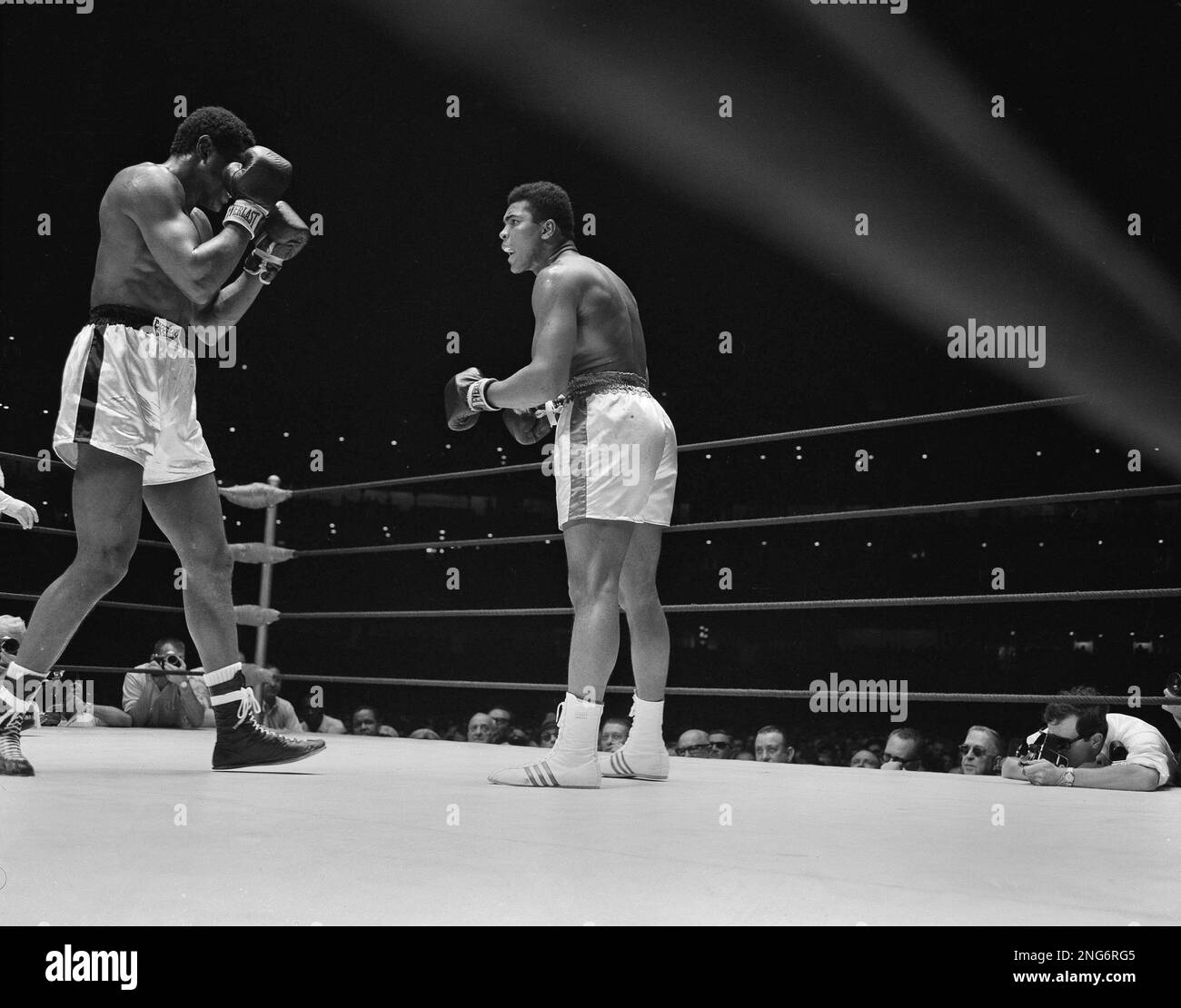 Muhammad Ali, right, yells at Ernie Terrell, "What's my name?" during ...