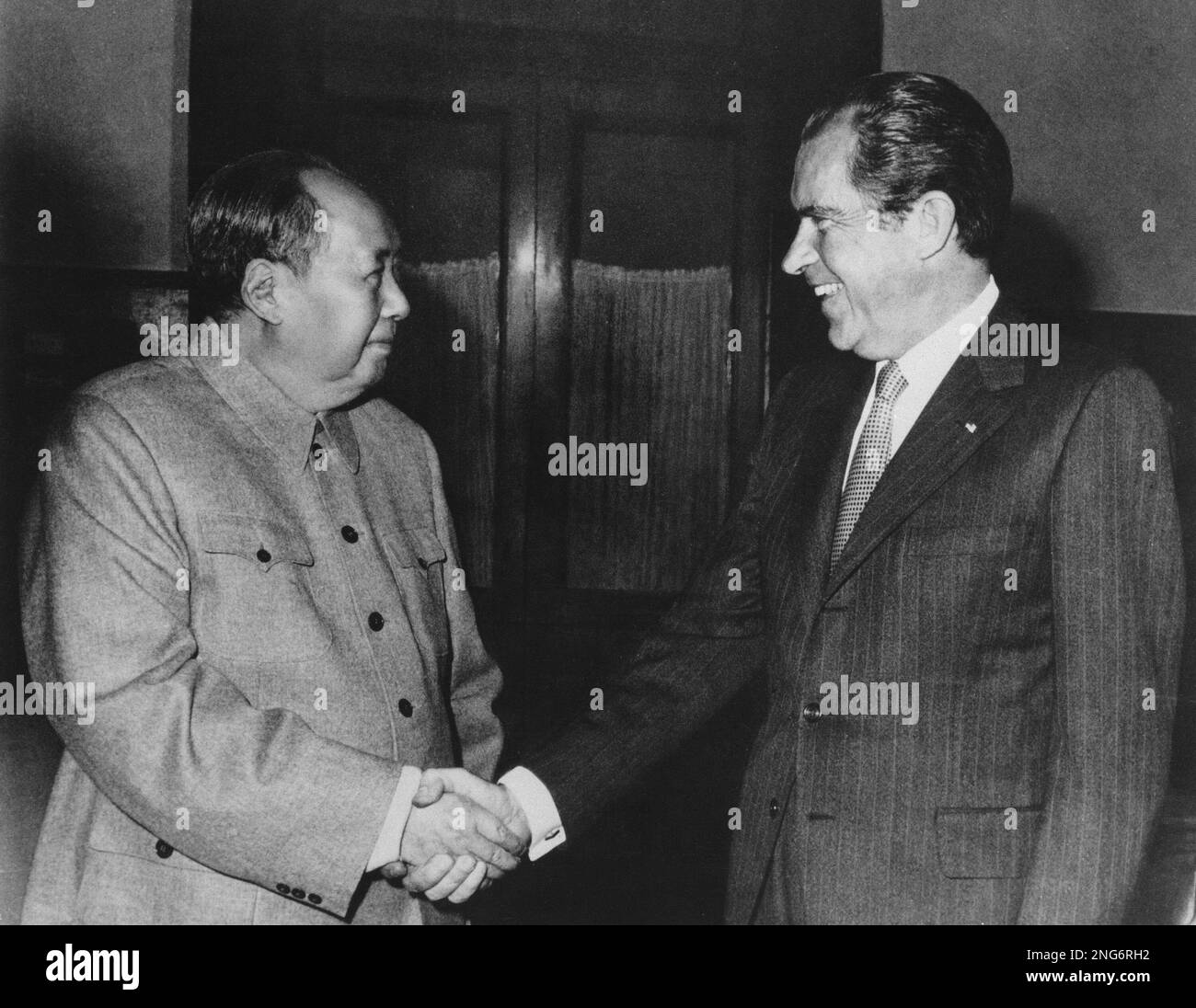 Chinese communist party leader Mao Tse-Tung, left, and U.S. President ...