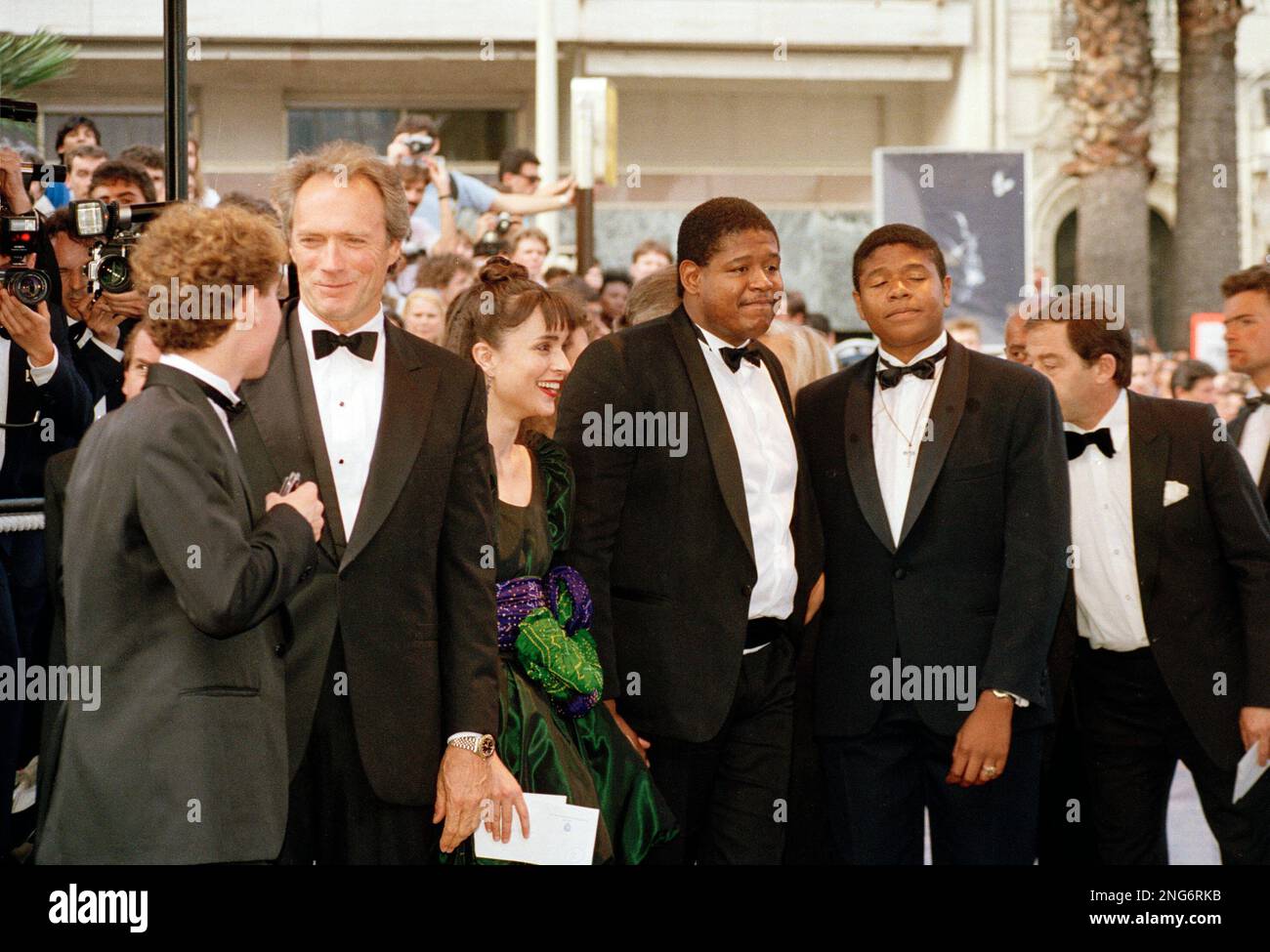 American actors and brothers, Forest Whitaker, fourth from left, and ...