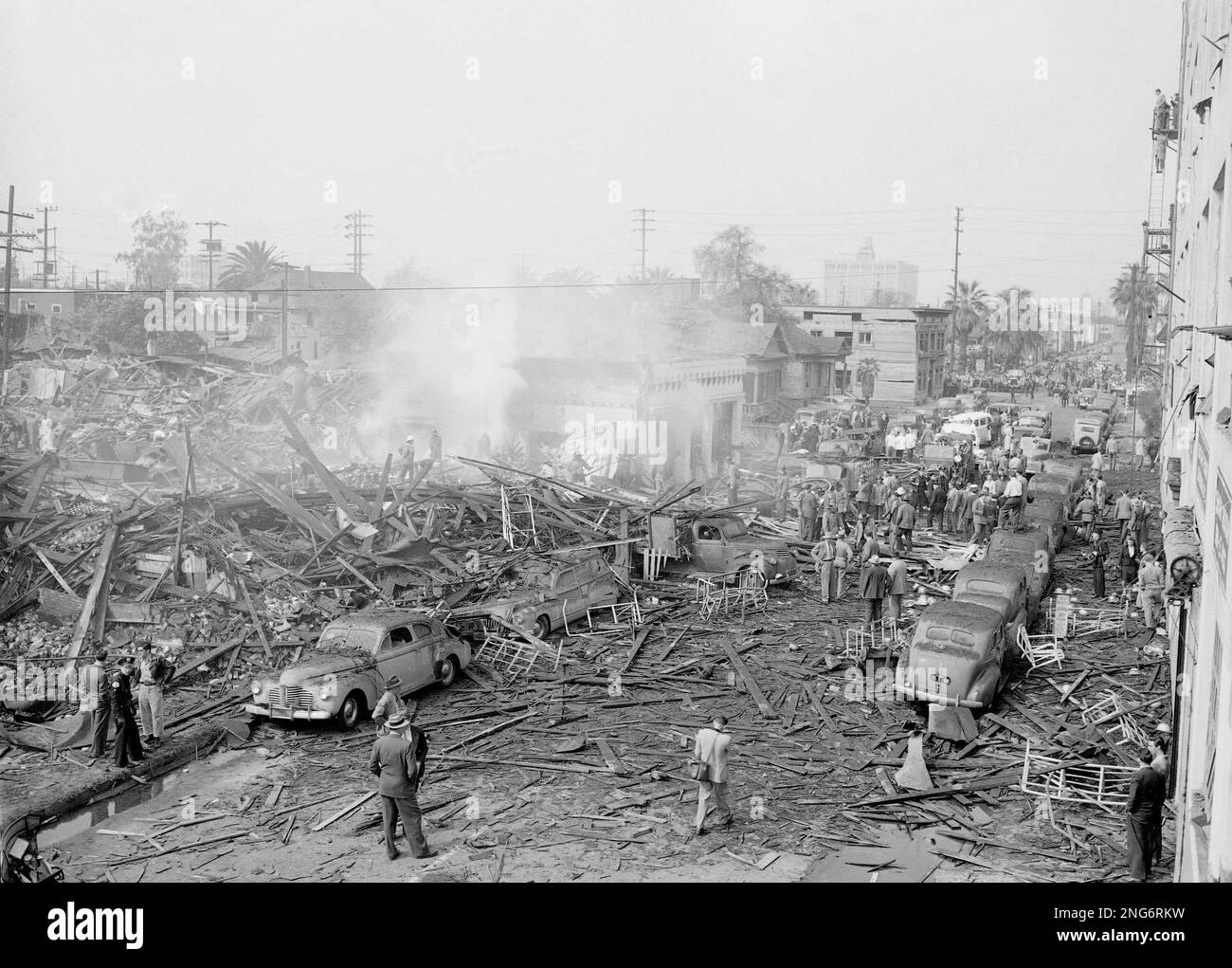 This is a general view of the wreckage of a two-story building that ...