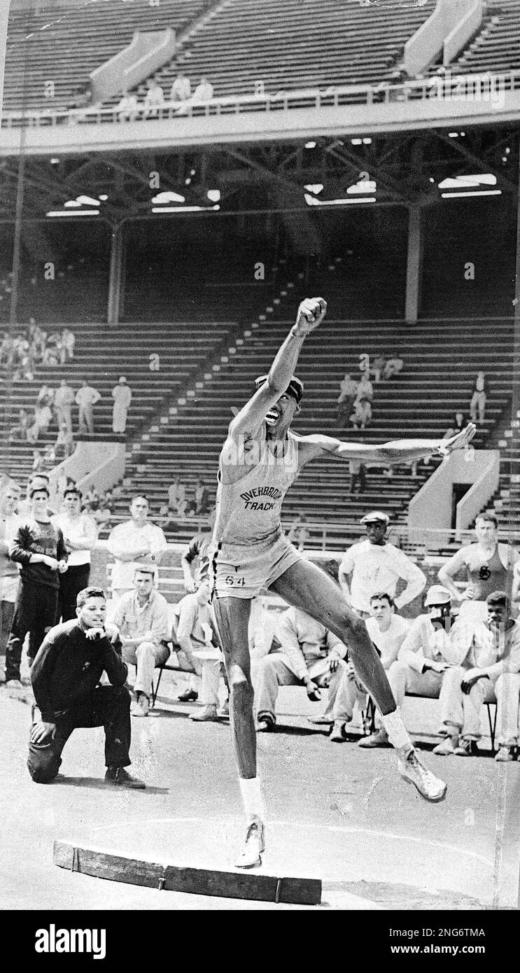 Overbrook High School athlete Wilt Chamberlain wins the shot put event ...