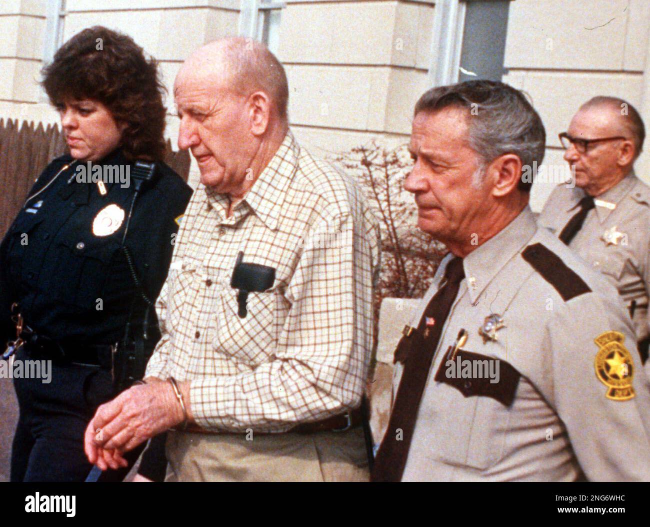 FILE-- Ray Copeland, center, is led in handcuffs from the Livingston ...