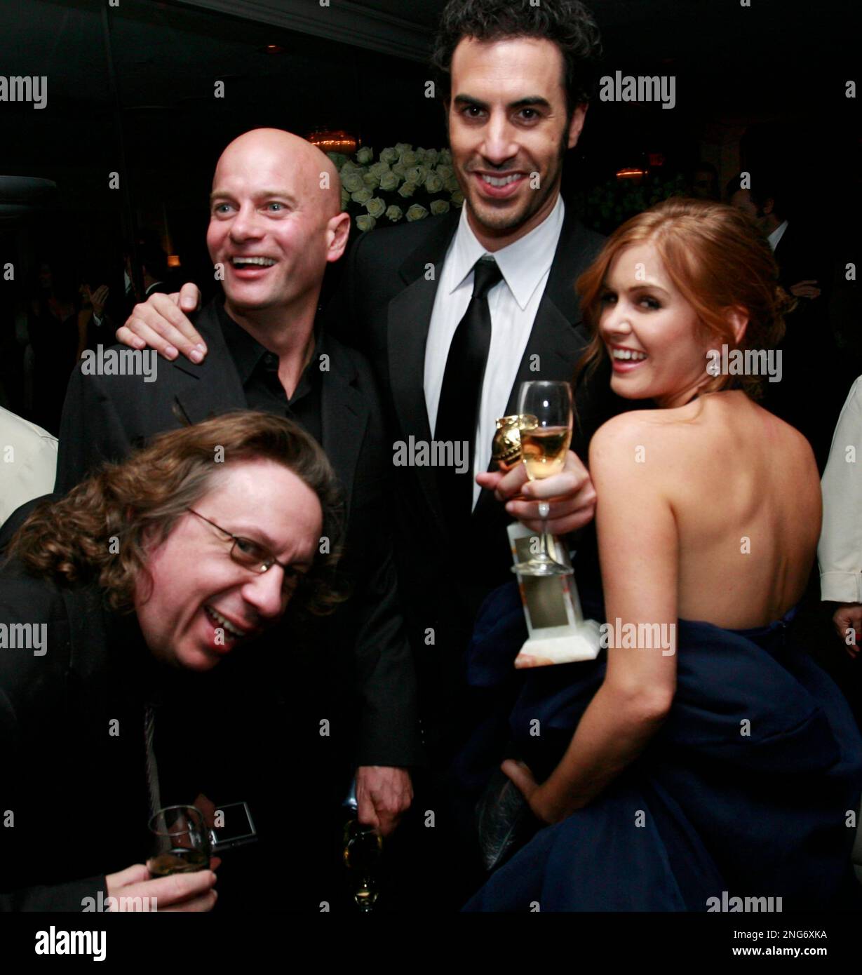 Sacha Baron Cohen, center, attends the 20th Century FOX party following ...