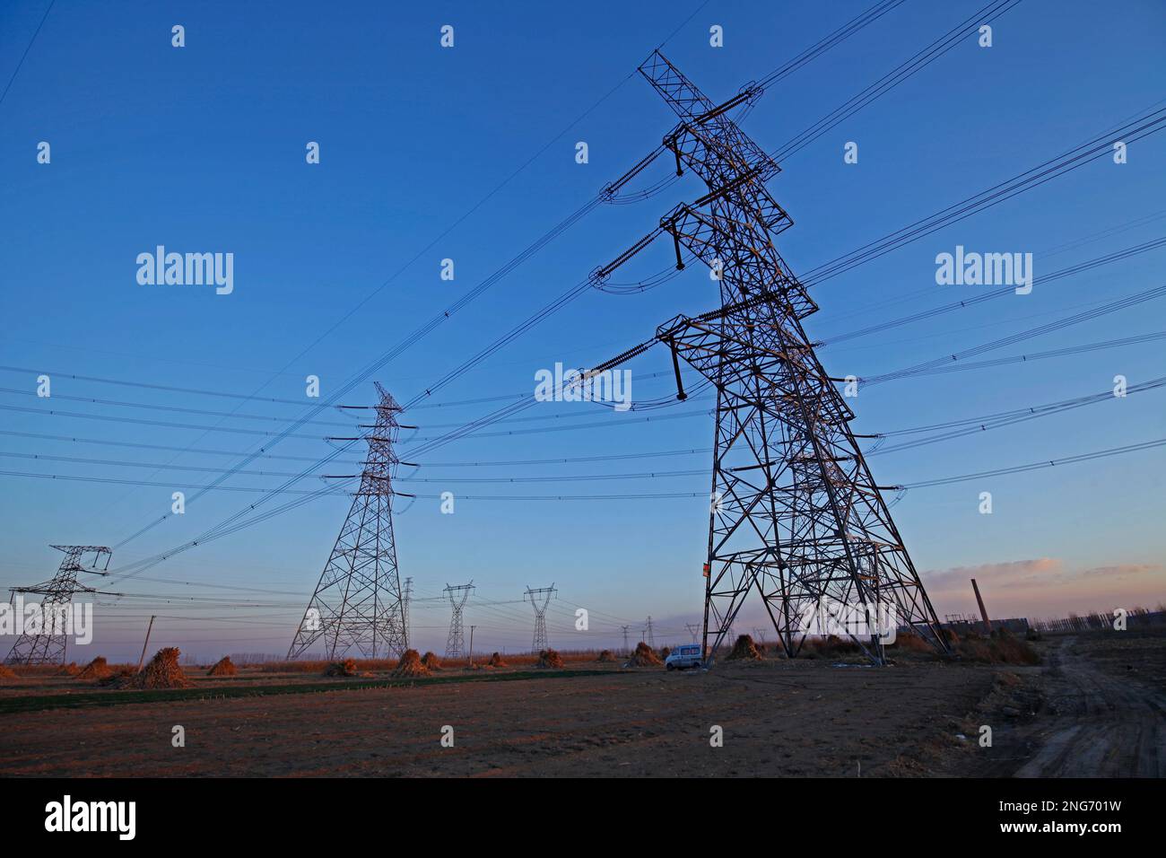 High voltage electric tower line Stock Photo - Alamy