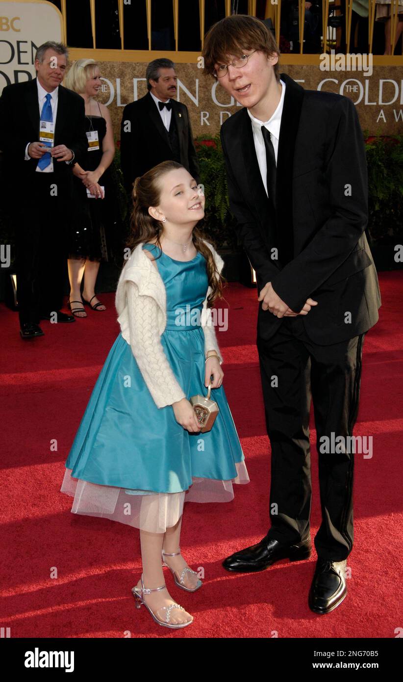 Abigail Breslin, left, and Paul Dano arrive for the 64th Annual Golden ...