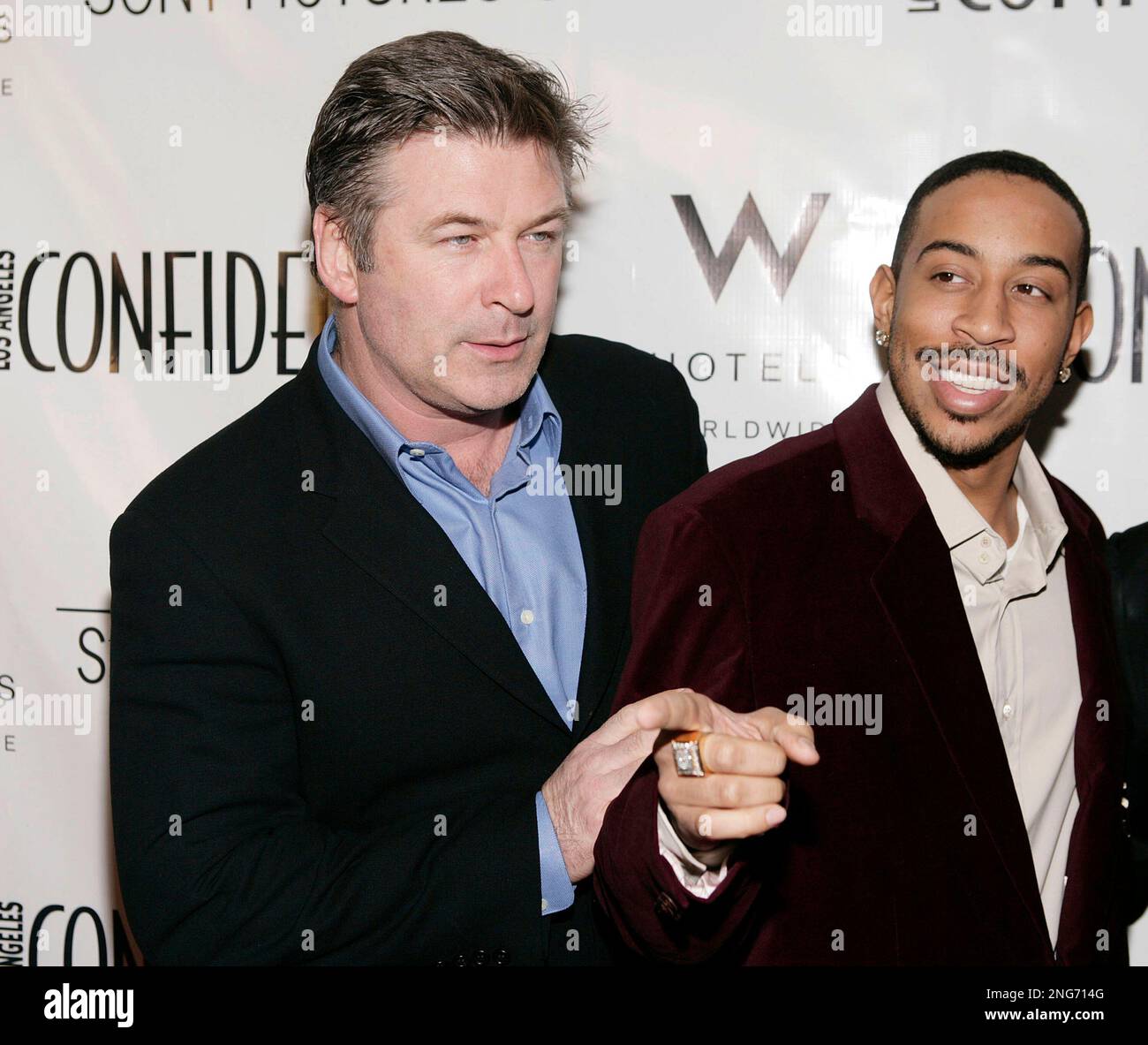 Alec Baldwin, left, and Ludacris arrive at the Los Angeles Confidential ...