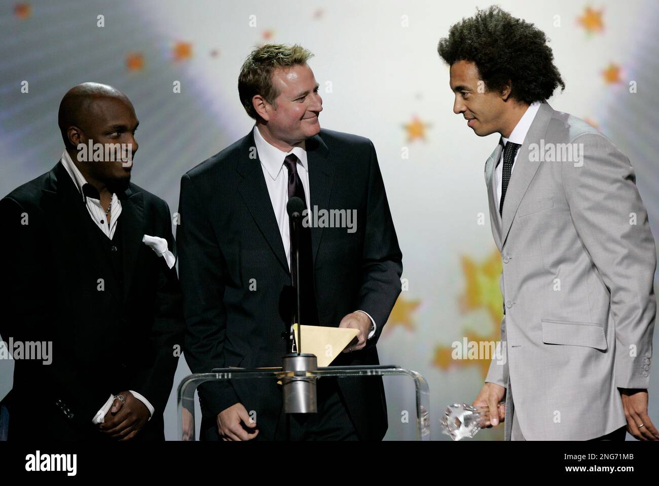 Damon Thomas, left, Randy Spendlove, center and Harvey Mason Jr. accept ...