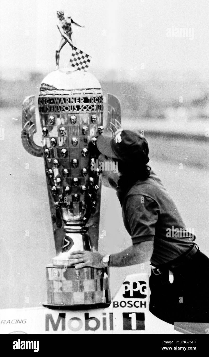 Indianapolis 500 mile winner Emerson Fittipaldi of Brazil gives the ...