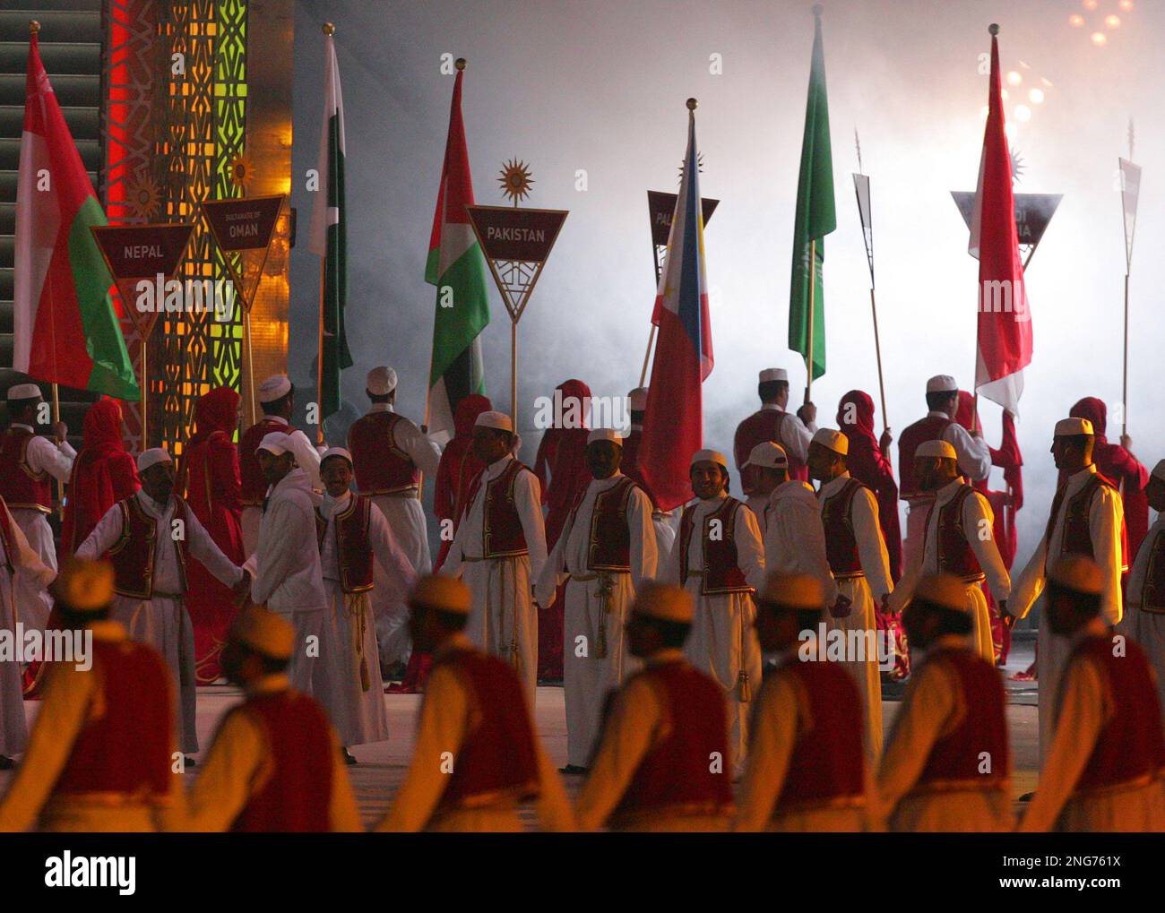 The flags of competing nations leave the arena during the Closing ...