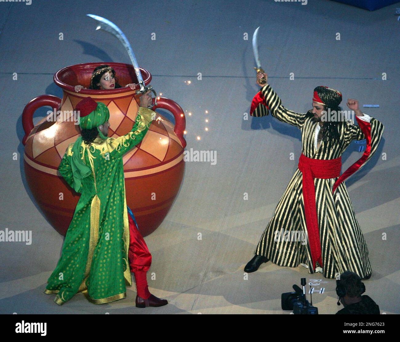Performers stage a swordfight during the Closing Ceremony of the Asian ...