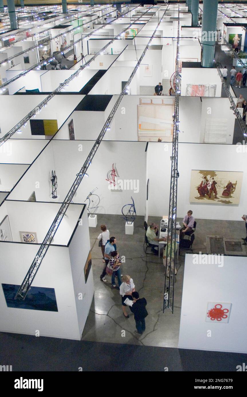 Art admirers walk the many hallways showing over 200 exhibits on ...
