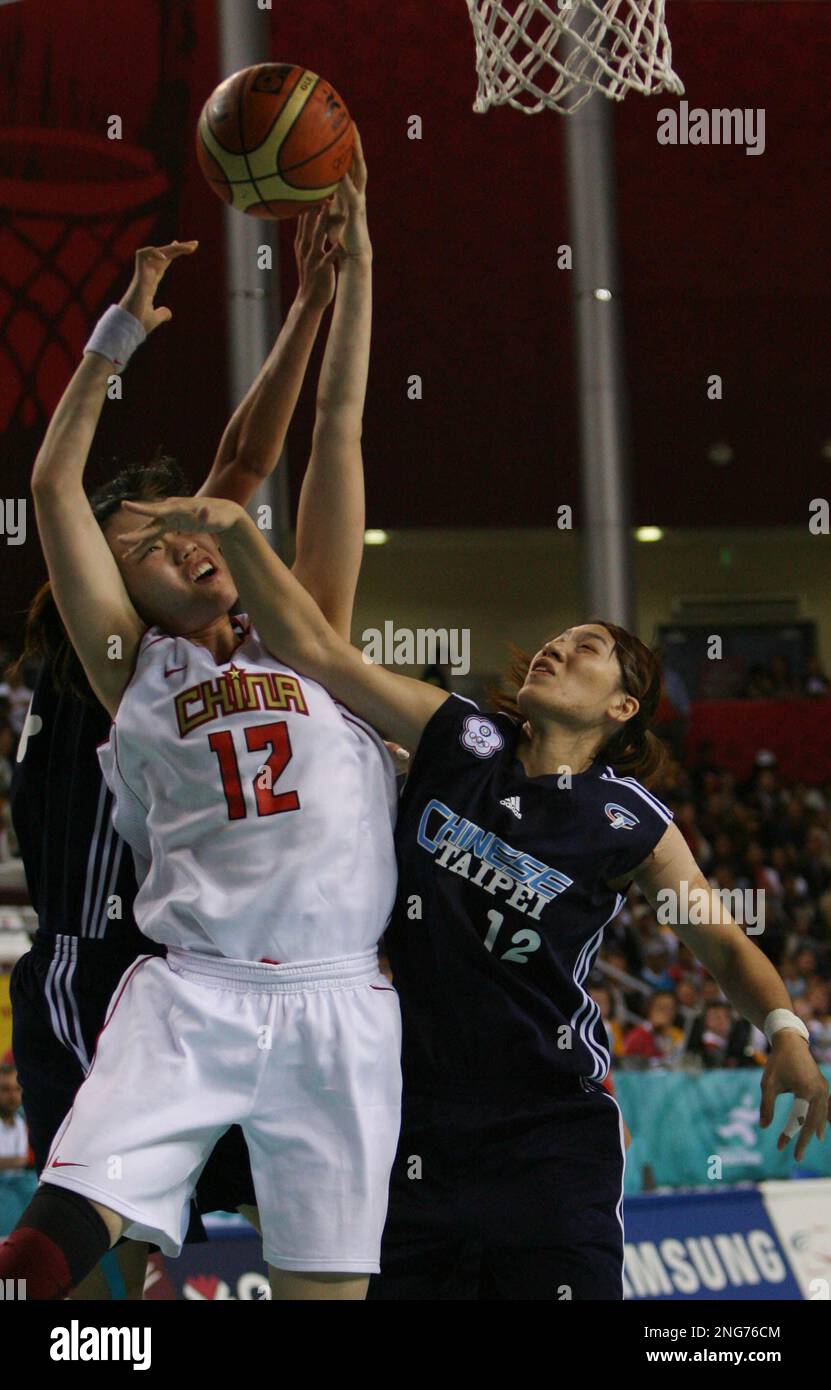 Chen Xiaoli of China, left, is challenged by Lin Hui-Mei of Taiwan ...