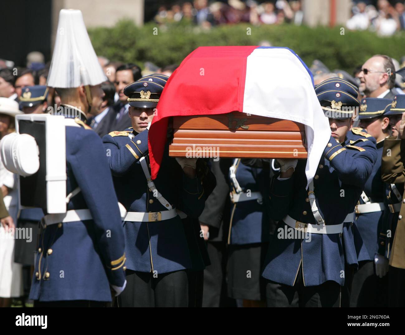 Chile's infantry soldiers carry the coffin with the remains of former ...