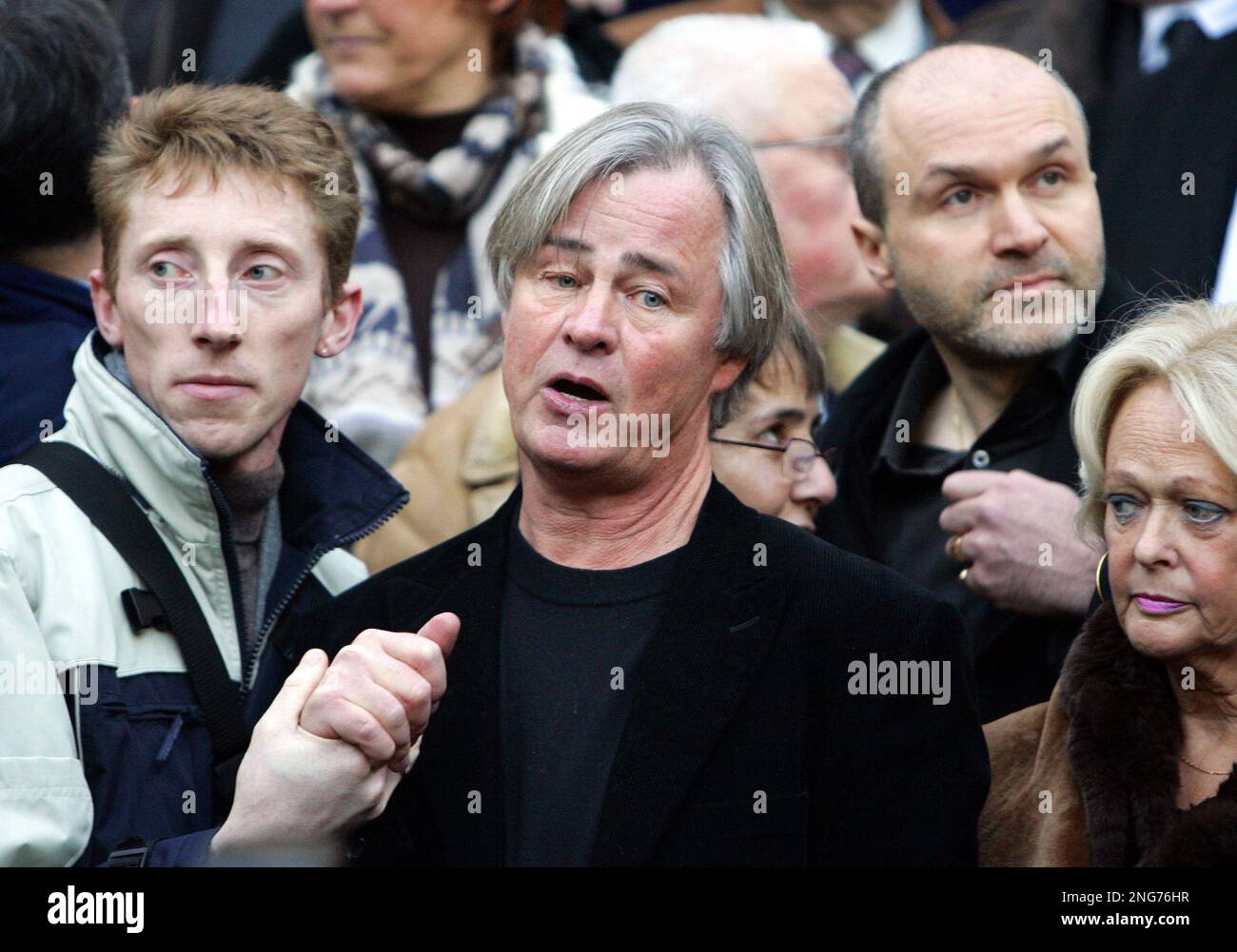 Denis Seznec, grandson of convict Guillaume Seznec, center, and his ...