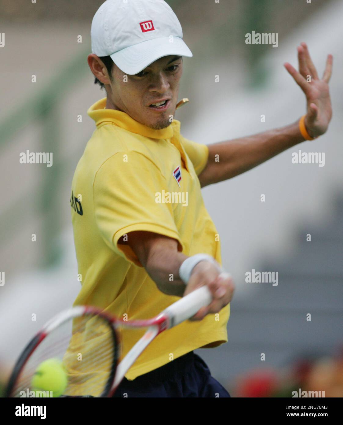 Danai Udomchoke of Thailand plays against Lee Hyun-taik of South Korea ...