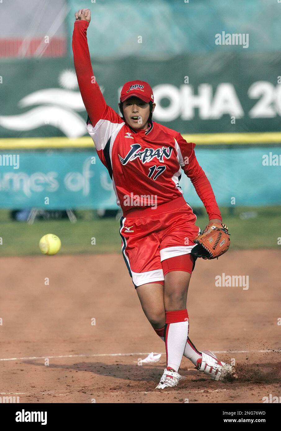 Japan's pitcher Yukiko Ueno throws the ball against during the Asian ...