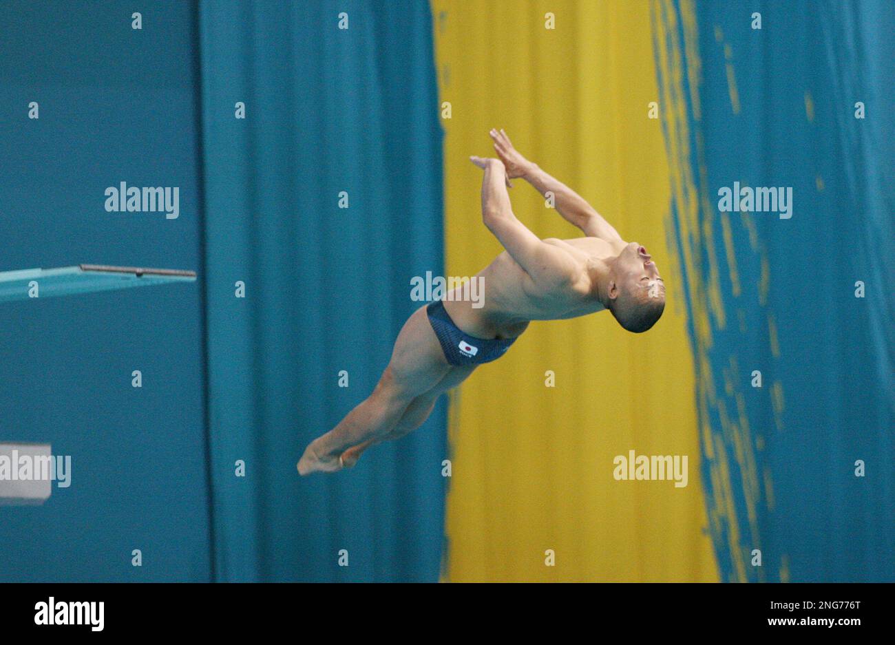 Japan's Ken Terauchi leaps at men's 3m springboard final in the Asian ...