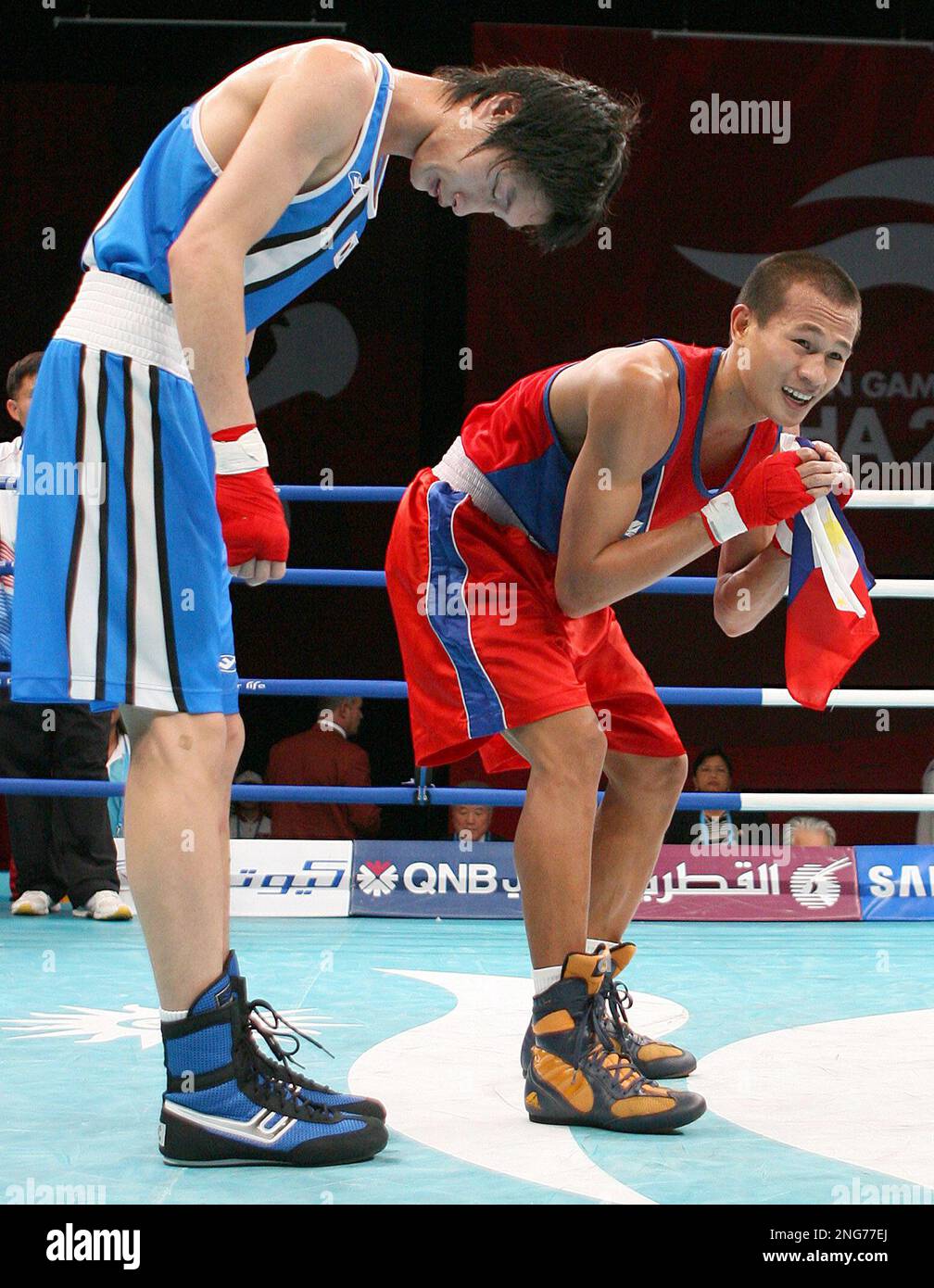 Joan Tipon of the Philippines, right, celebrates after beating South ...