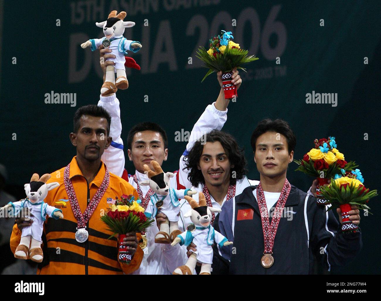 From left, silver medalist Malaysia's Ramasamy Puvaneswaran, gold ...