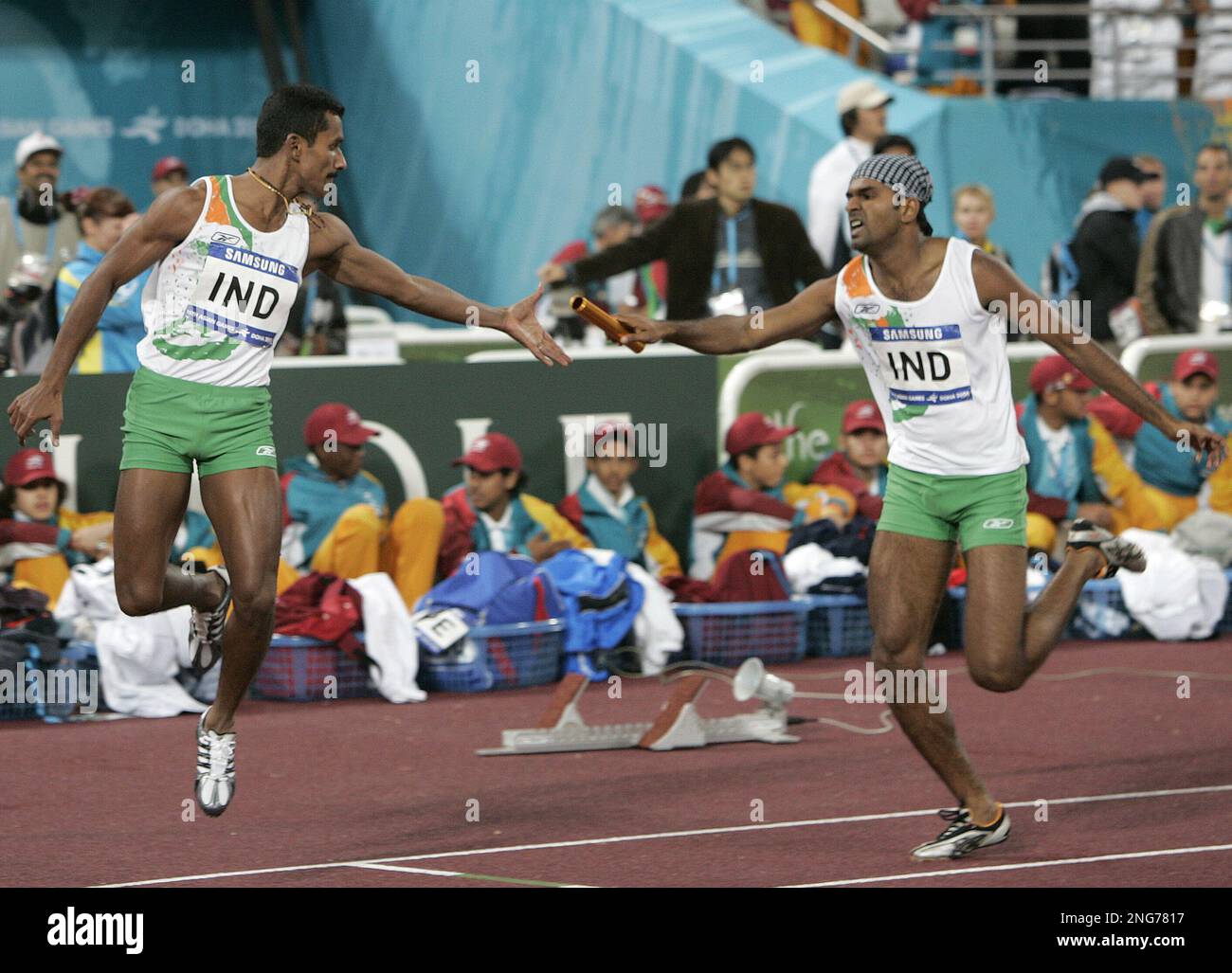 The Indian team makes a changeover during the Men's 4x400m relay final ...