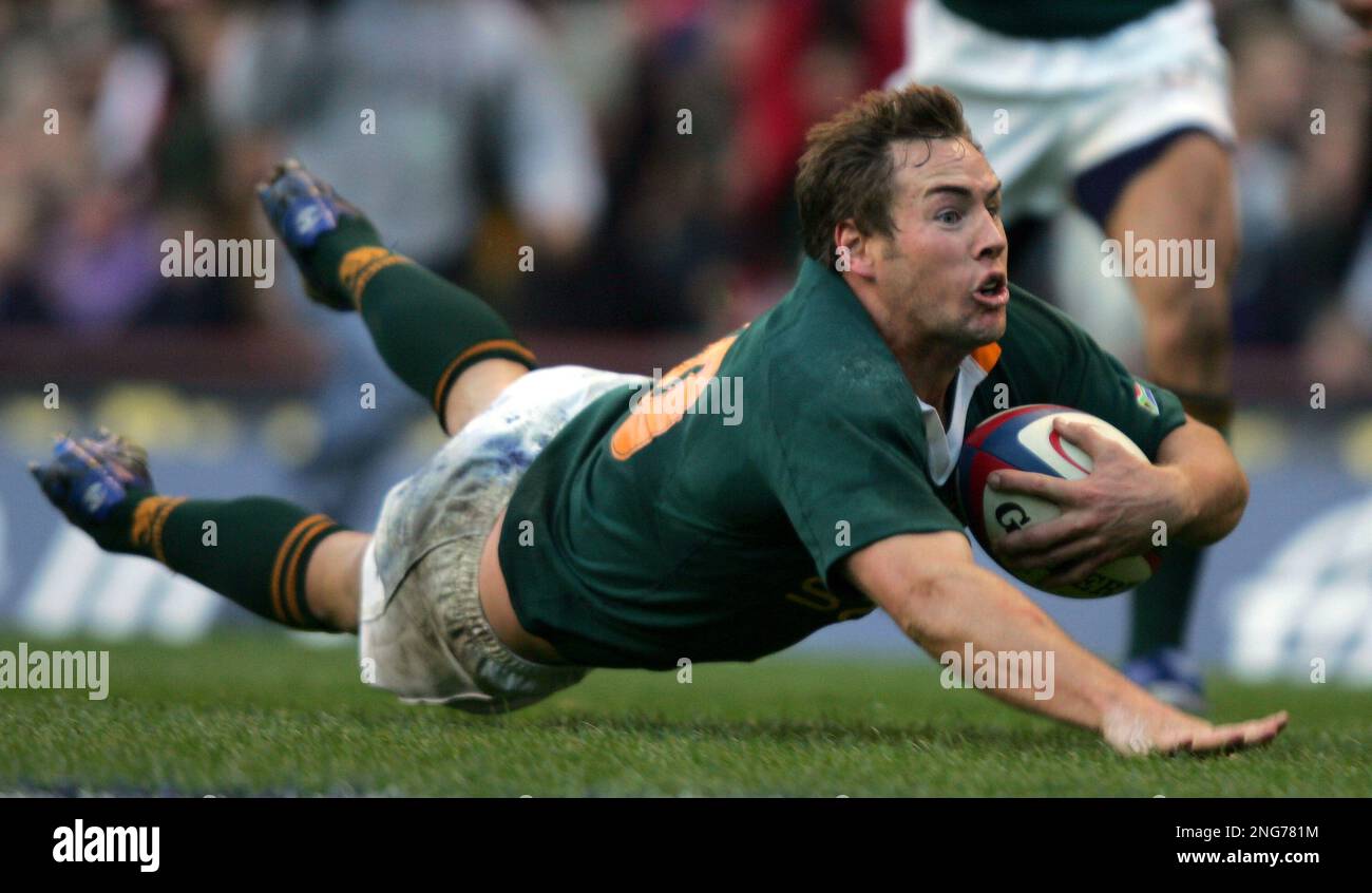 South Africa's Butch James scores a try during their rugby union ...