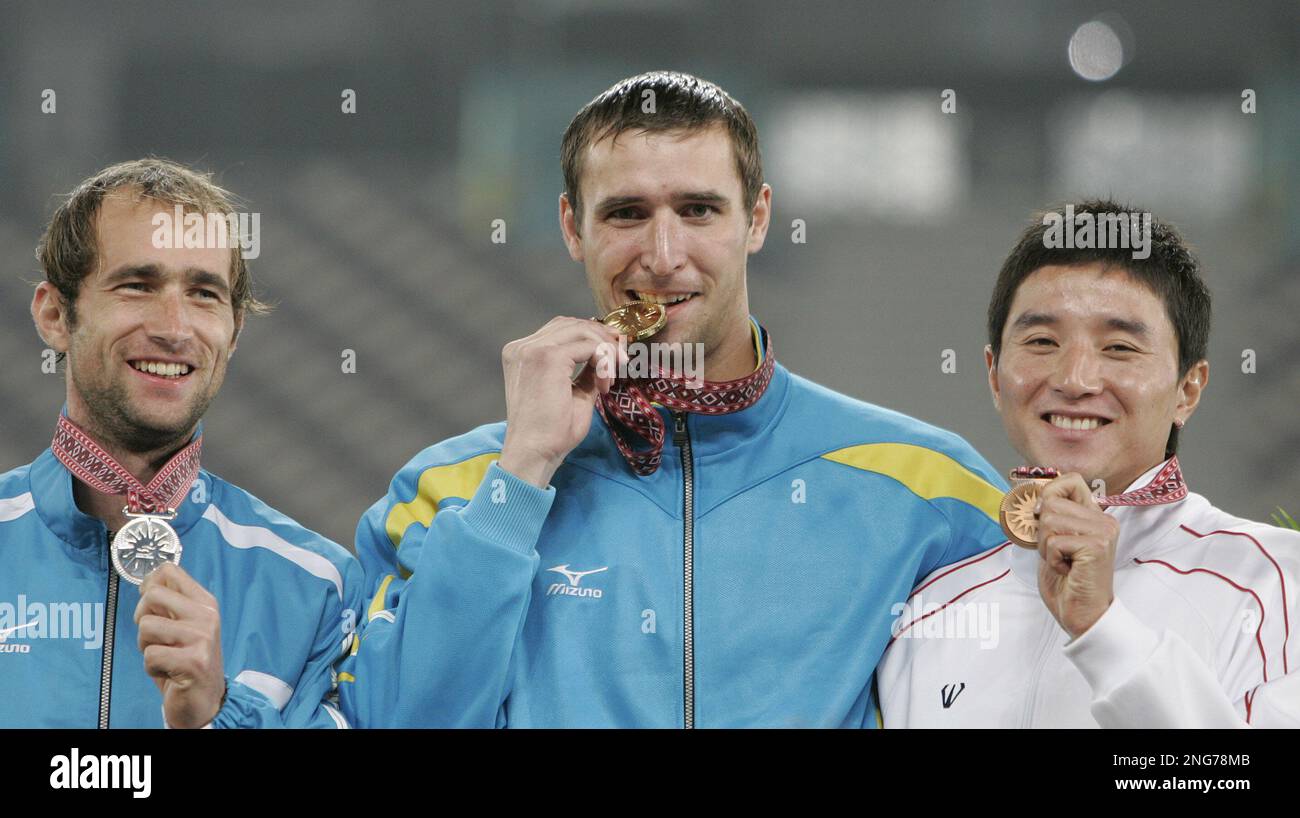 From left: Uzbekistan's Vitaliy Smirnov, silver, Kazakhstan's Dmitry Karpov, gold, and South ...