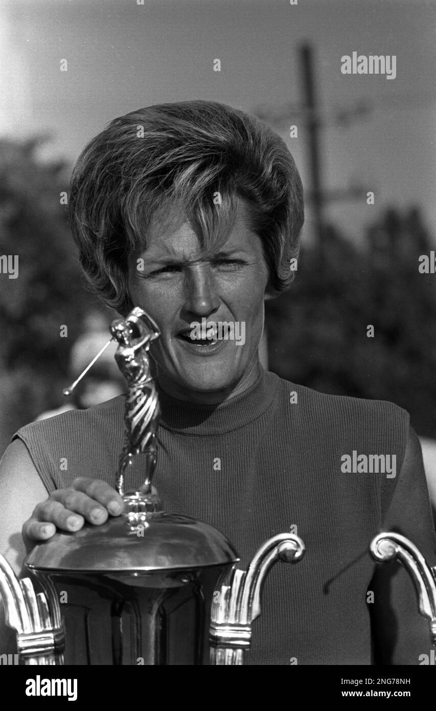 Kathy Whitworth holds her trophy after winning the Dallas Civitan Open ...