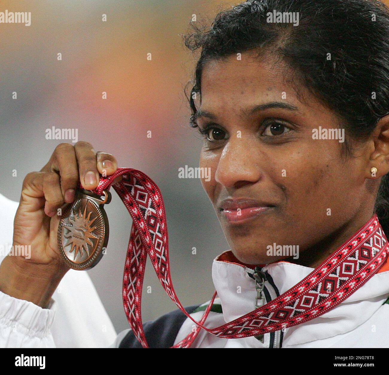 India's P. Jaisha Orchatteri holds the bronze medal for the final of ...
