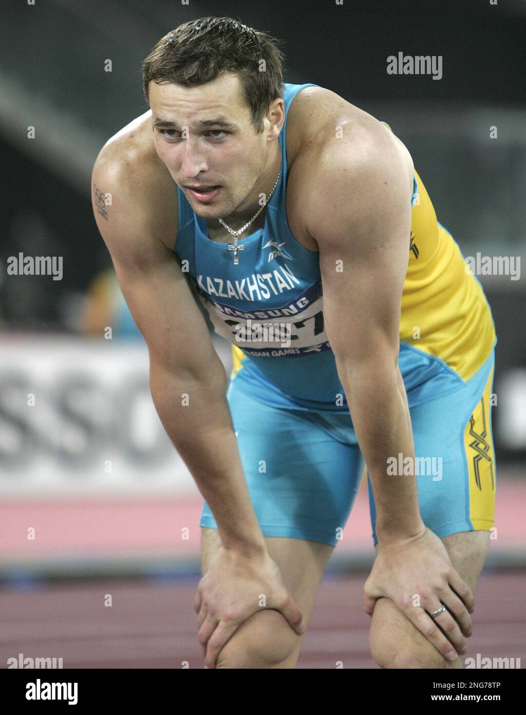 Kazakhstan's Dmitry Karpov pauses after finishing the Decathlon 1500m and clinching the gold ...