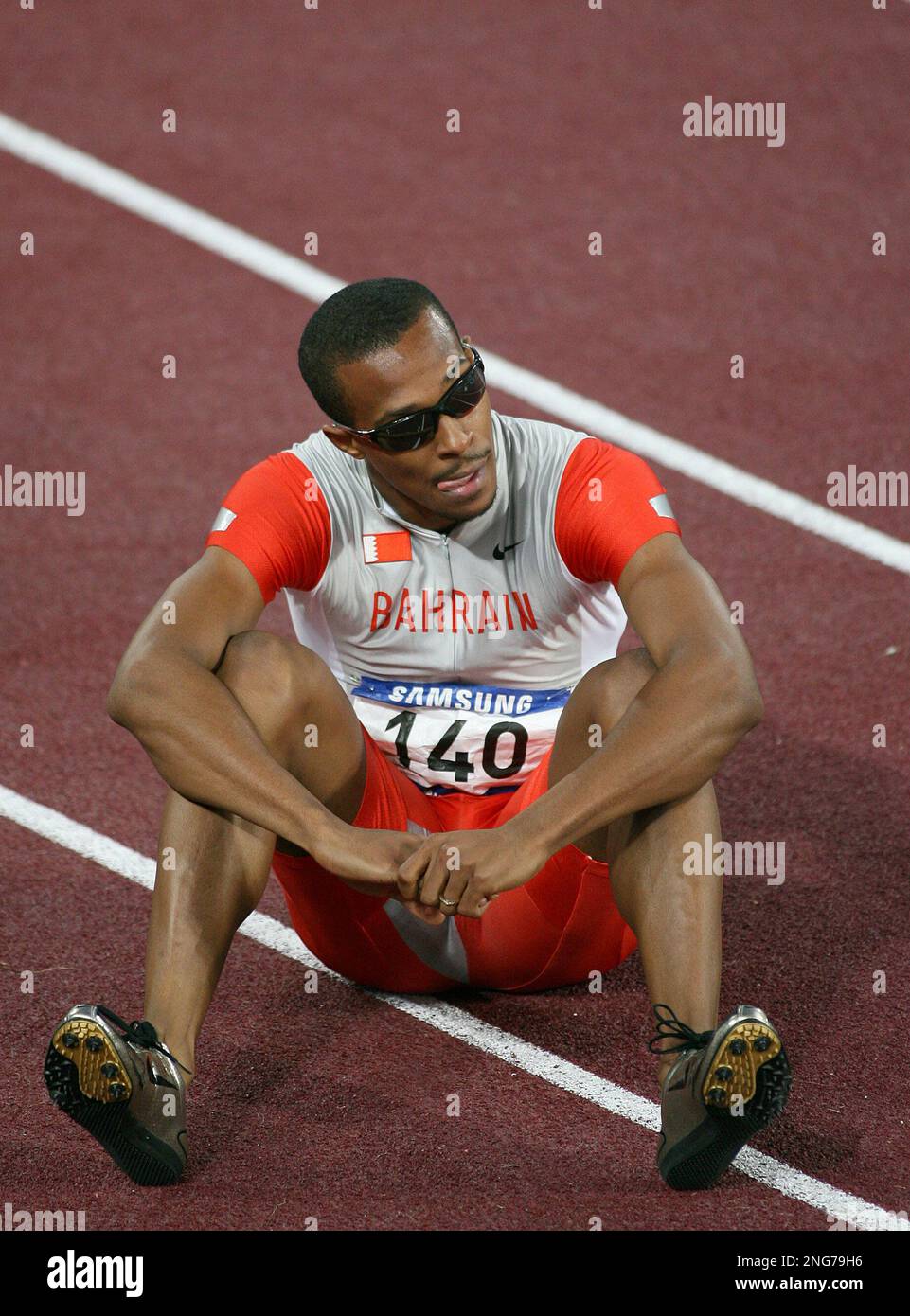 Bahrain's Brandon Allan Simpson sits on the track after taking the ...
