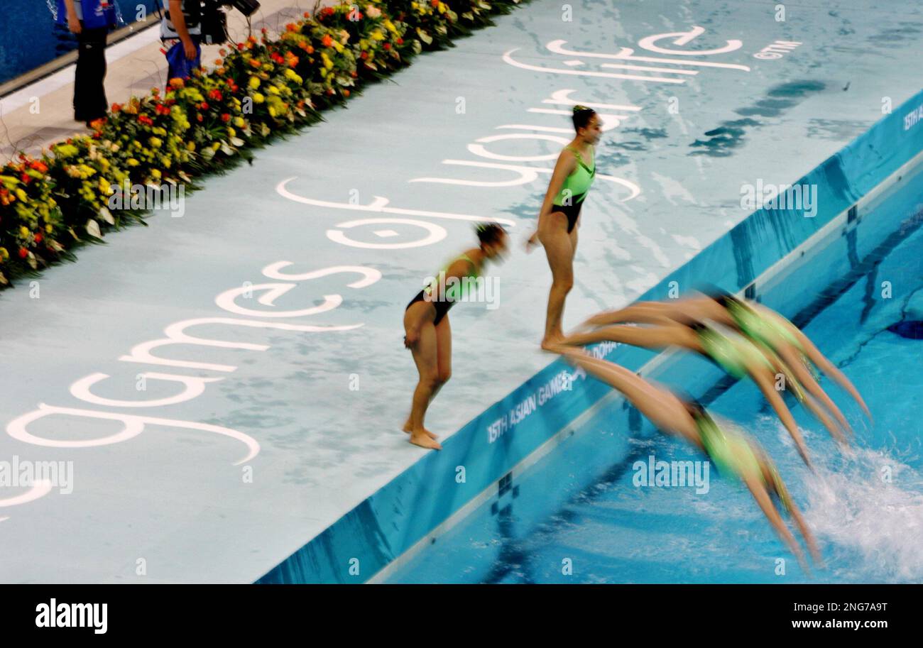 The North Korean team members dive into the pool for a technical ...