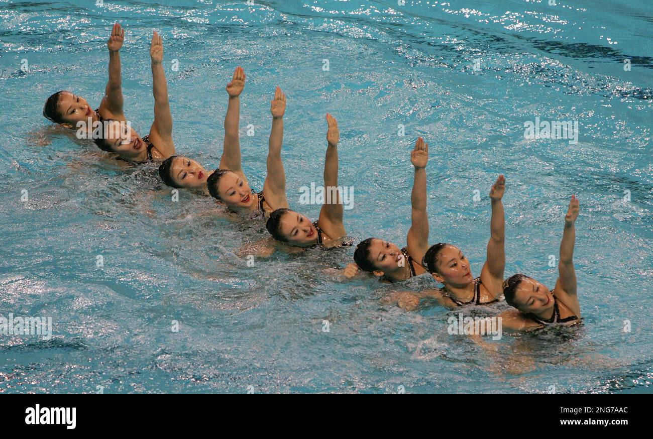 The Japanese team performs a technical routine of synchronized swimming ...