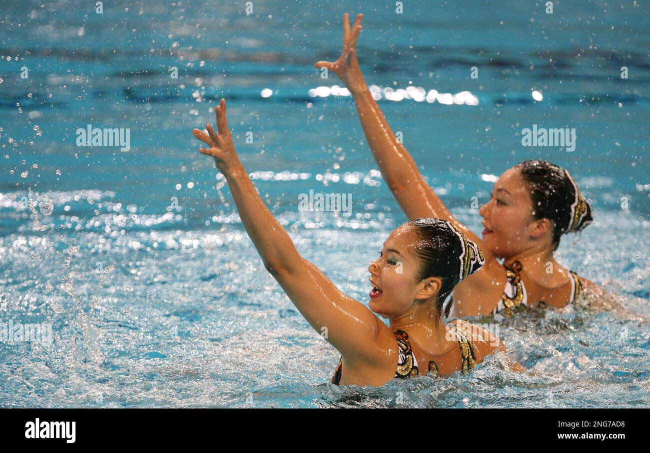 The Japanese duet team performs a free routine of synchronized swimming ...