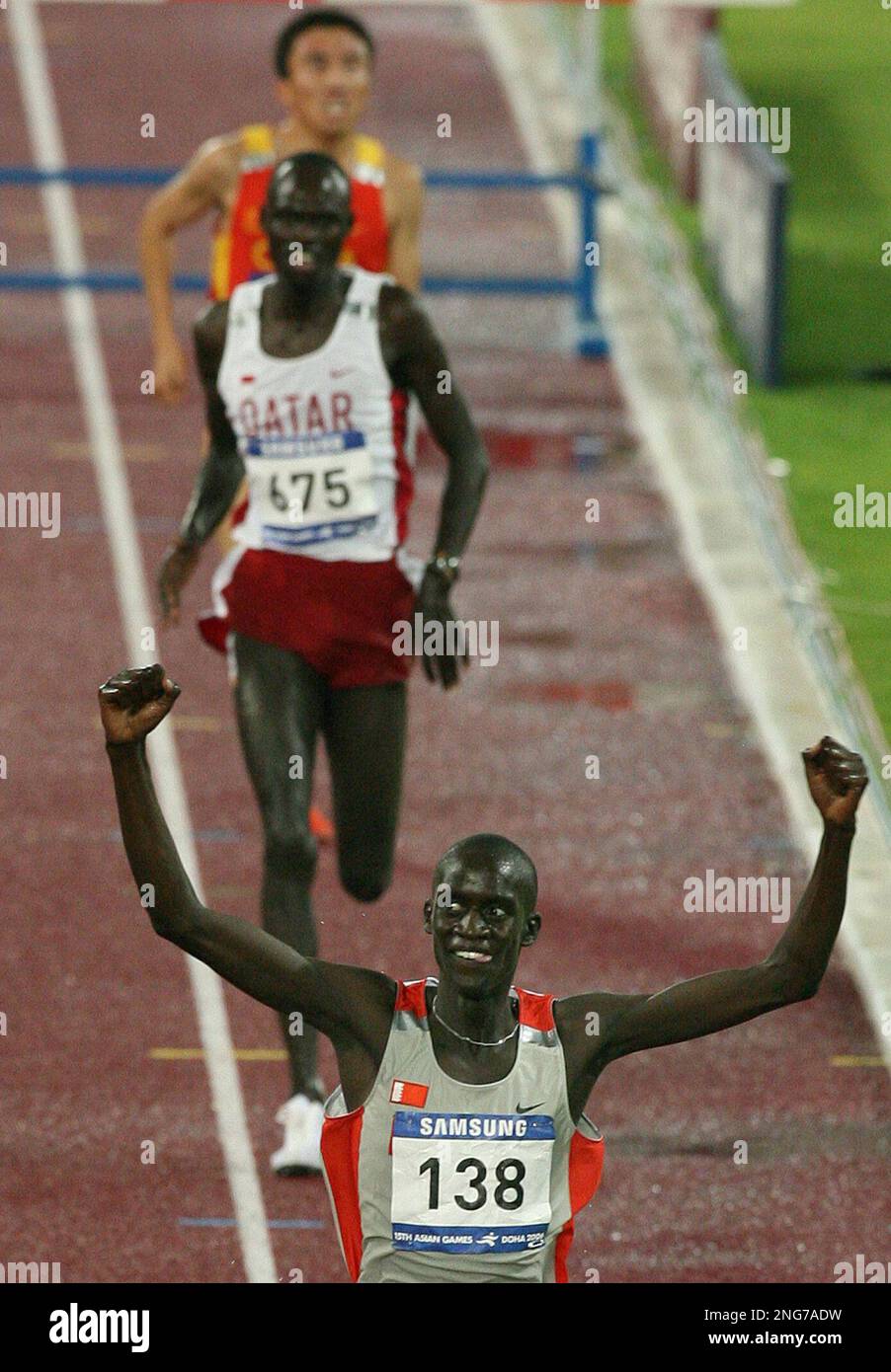 Bahrain's Tareq Mubarak Salem celebrates as he approaches the finish ...