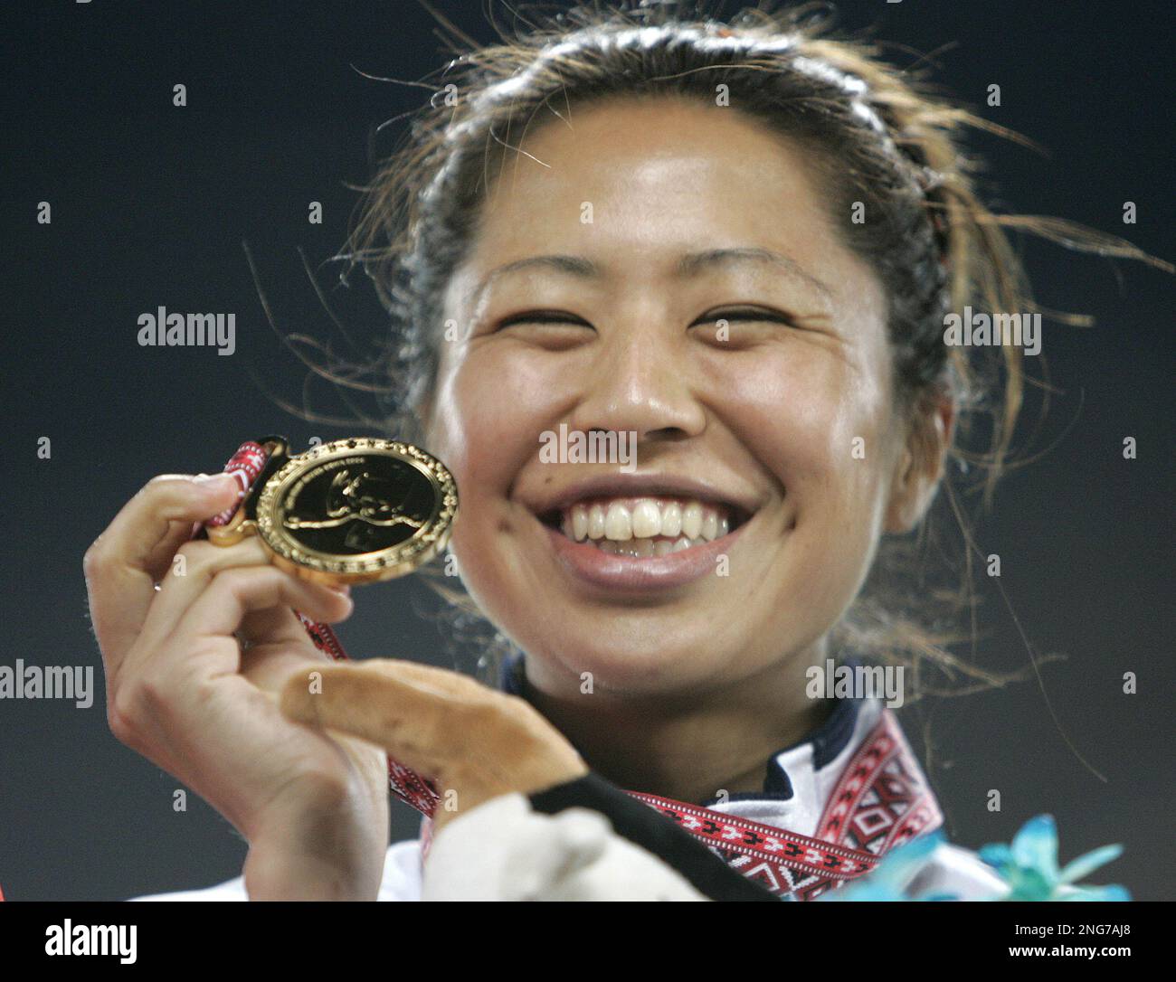 Japan's Kayoko Fukushi smiles after receiving the the gold medal she ...