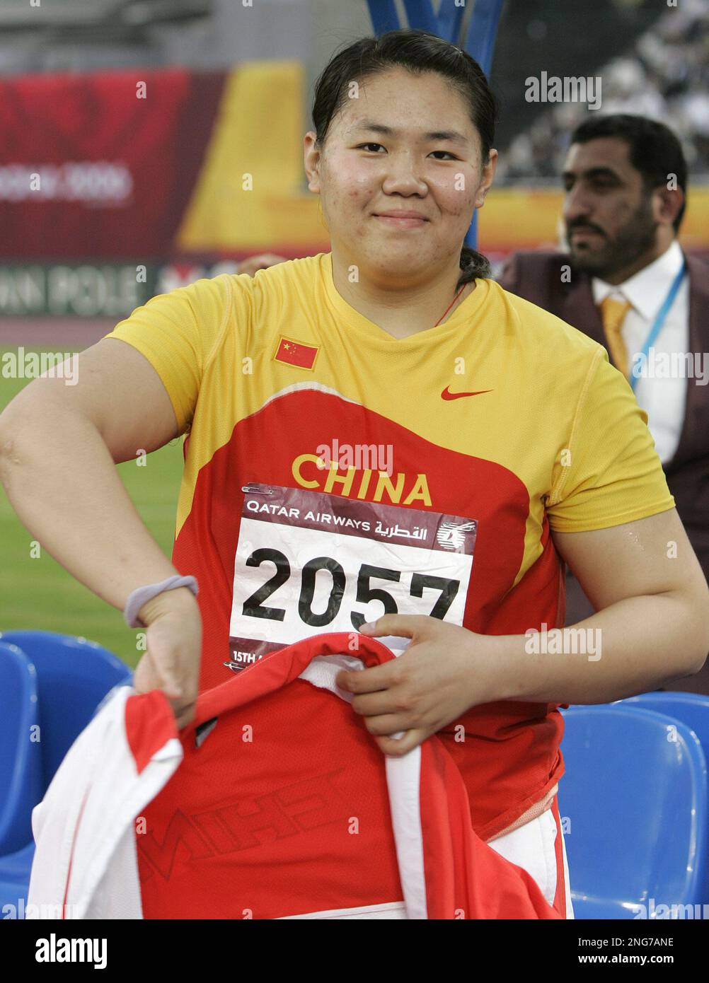 China's Zhang Wenxiu smiles after winning the gold medal in the final ...