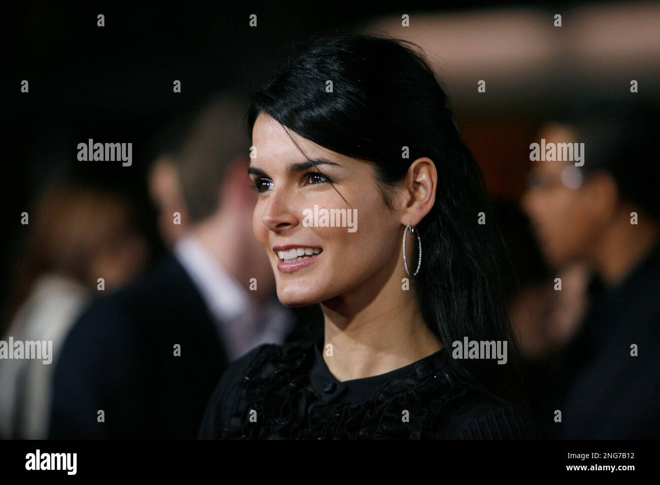 Actress Angie Harmon arrives at the film premiere of "Pursuit of ...
