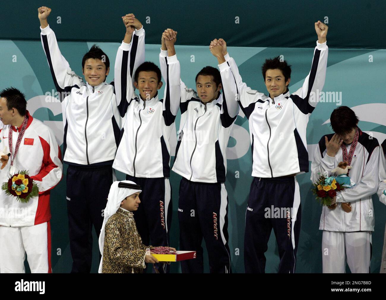 Japan's 4X100m relay team, from left to right, Daisuke Hosokawa,Takashi ...