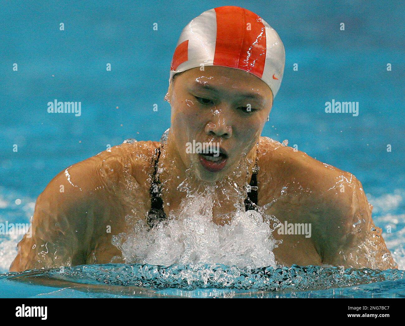 China's Qi Hui on her way to taking the gold medal in the final of the ...