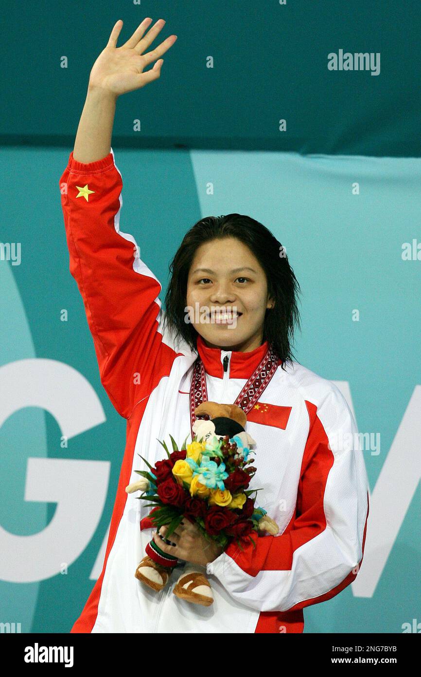 China's Xu Yanwei waves after receiving the gold medal she won in the ...