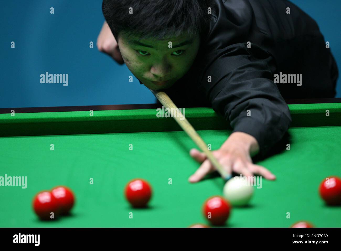 Ding Junhui of China takes aim during the Men's Snooker-Doubles gold ...