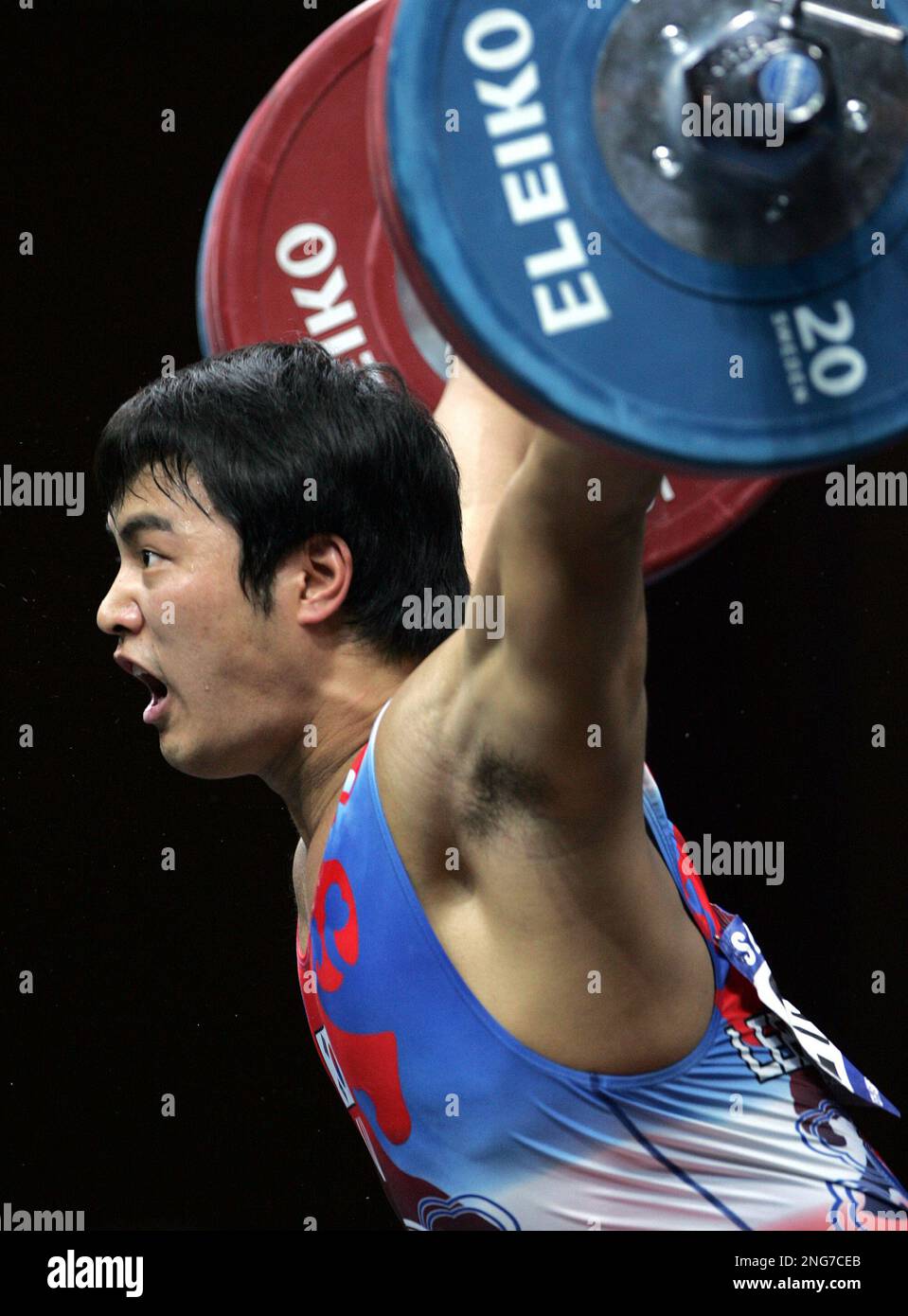 South Korea's Lee Ung-jo lifts 165 kg in snatch of men's 94kg weightlifting at the 15th Asian ...