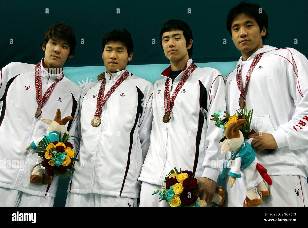 The South Korean team display their bronze medals during the medal ceremony for the final of the ...
