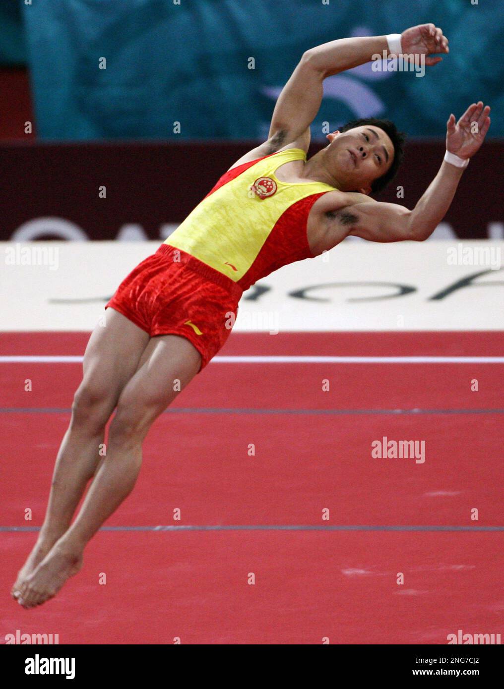 Zhou Kai of China perfoms on his way to win the gold medal in the ...