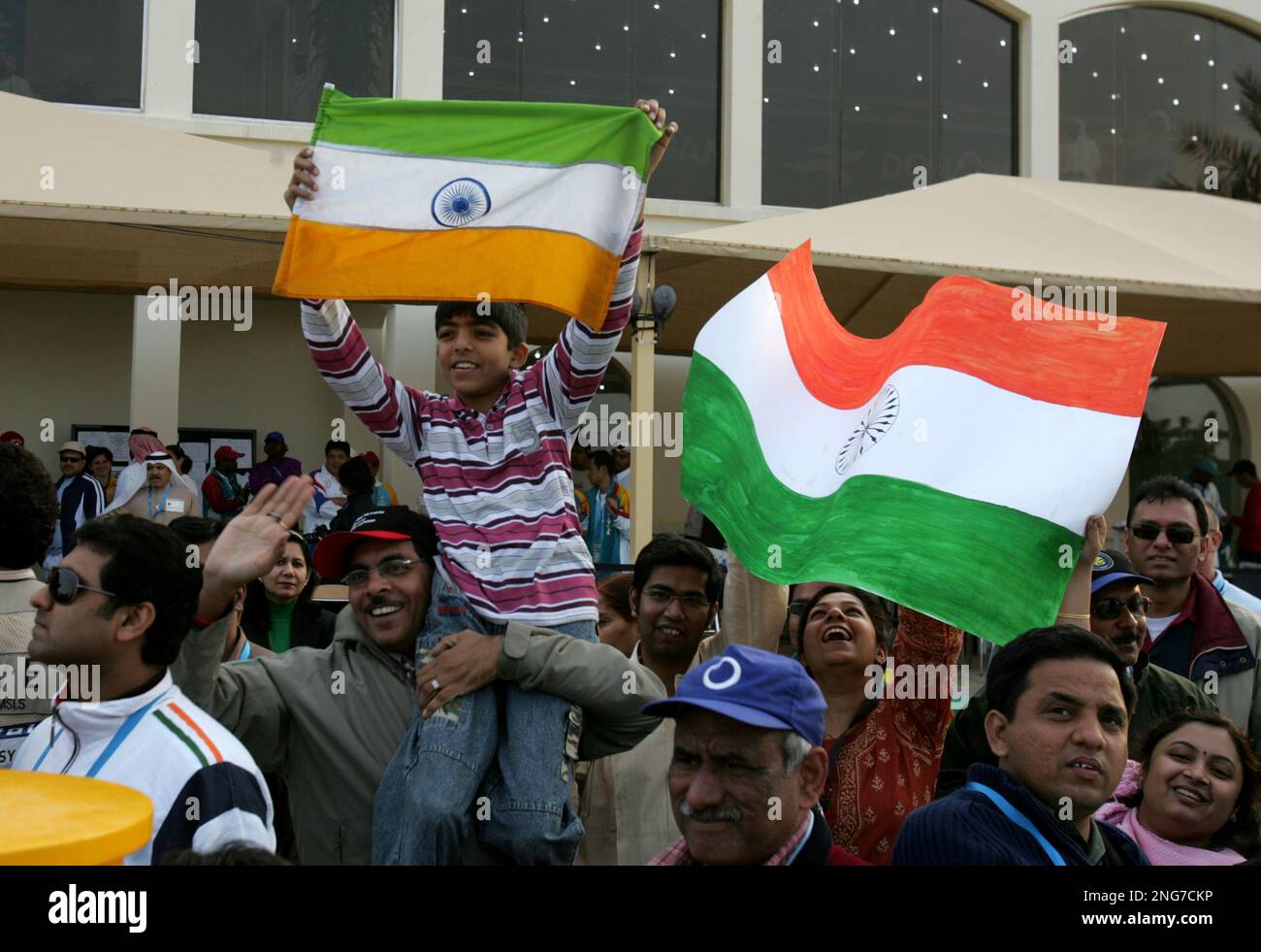 Indian fans cheer Rajyavardhan Singh Rathoreas after he won the bronze ...