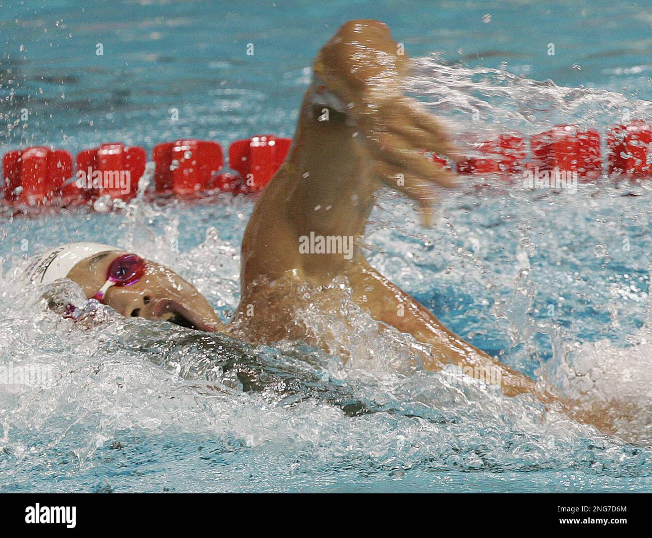 Japan's Daisuke Hosokawa anchoring the Japanese team to the gold medal ...