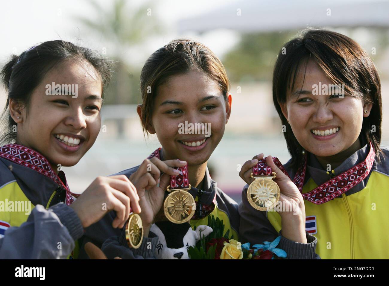 Thailand's gold medal winning trio, fromleft Chotpaibunsin Thanyalak ...