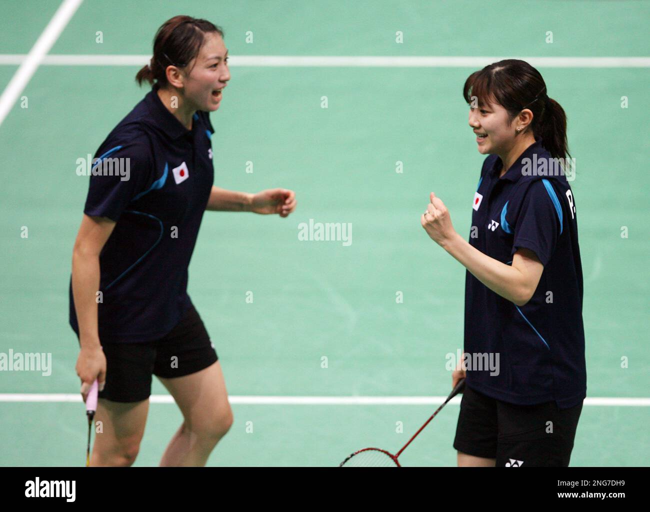 Japan's pair Reiko Shiota, right, and Kumiko Ogura celebrate their ...
