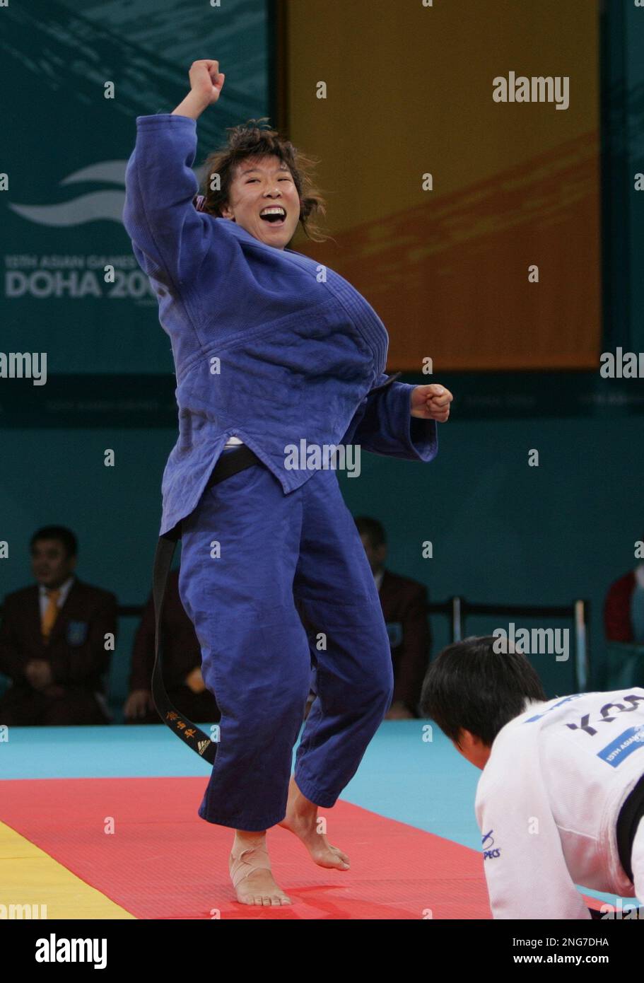 Xu Yuhua of China reacts after defeating South Korea's Kong Ja-young to ...
