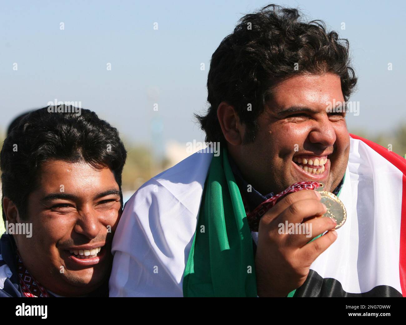Gold winner Meqlad Naser of Kuwait, right, and bronze winner Almudhaf ...